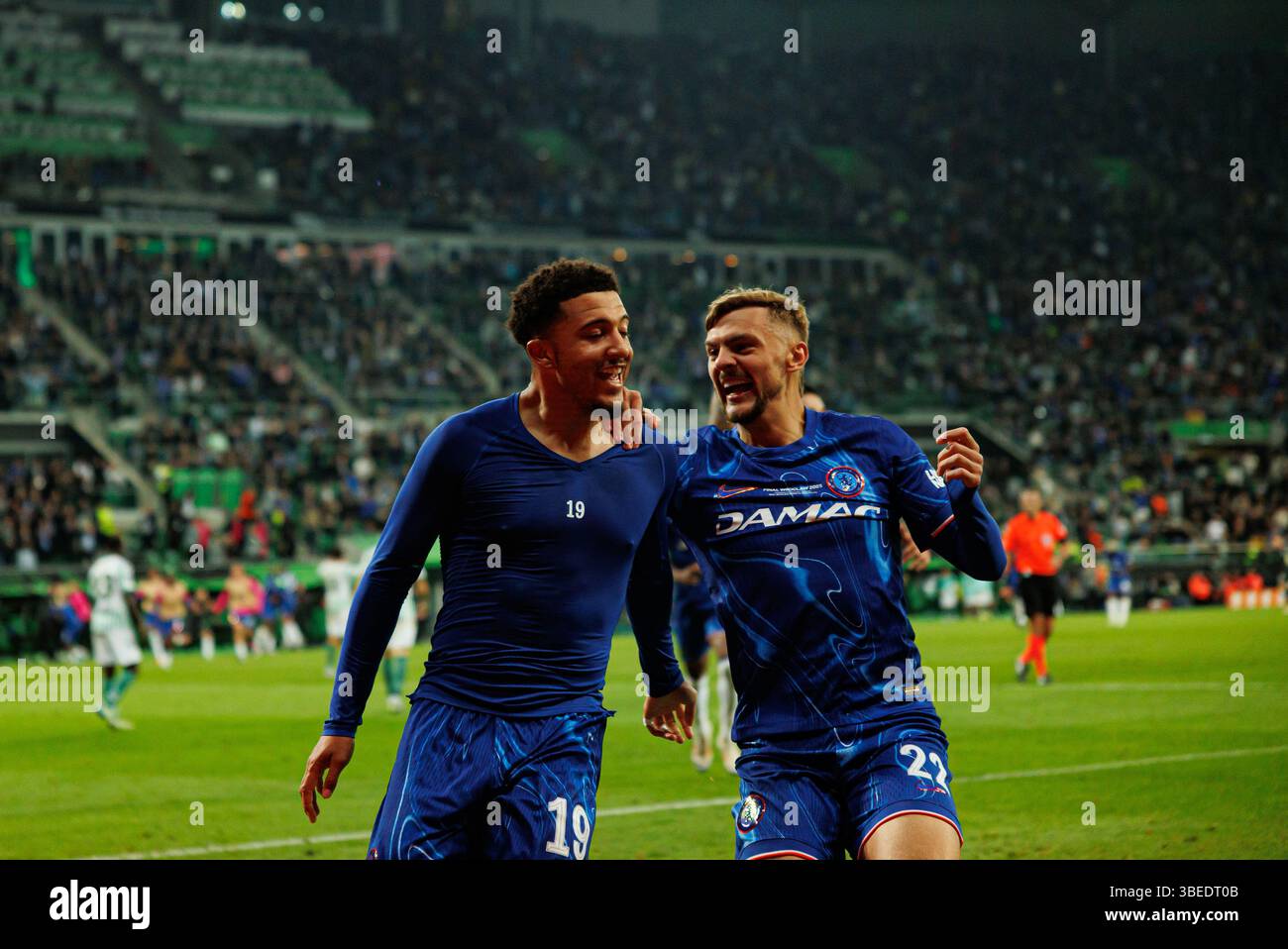 Jadon Sancho and Kiernan Dewsbury-Hall seen celebrating after scoring goal during UEFA ...