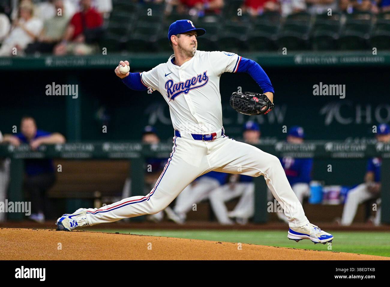Texas Rangers starting pitcher Tyler Mahle throws a pitch during the ...