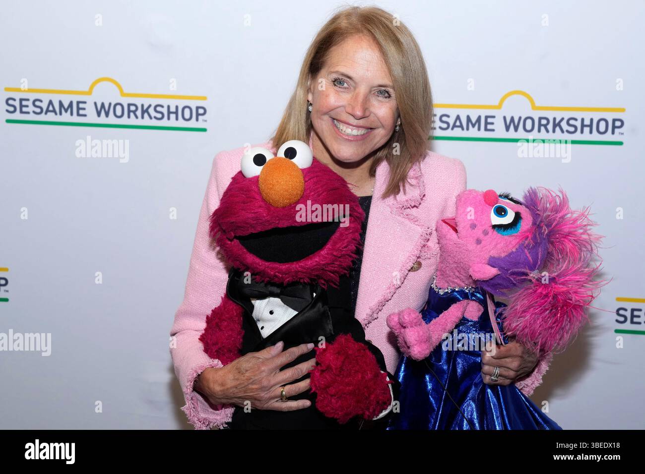 Katie Couric poses with Sesame Street Muppets at the Sesame Workshop ...