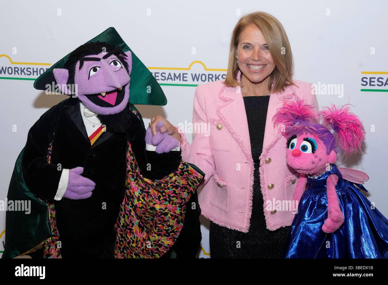 Katie Couric poses with Sesame Street Muppets at the Sesame Workshop ...