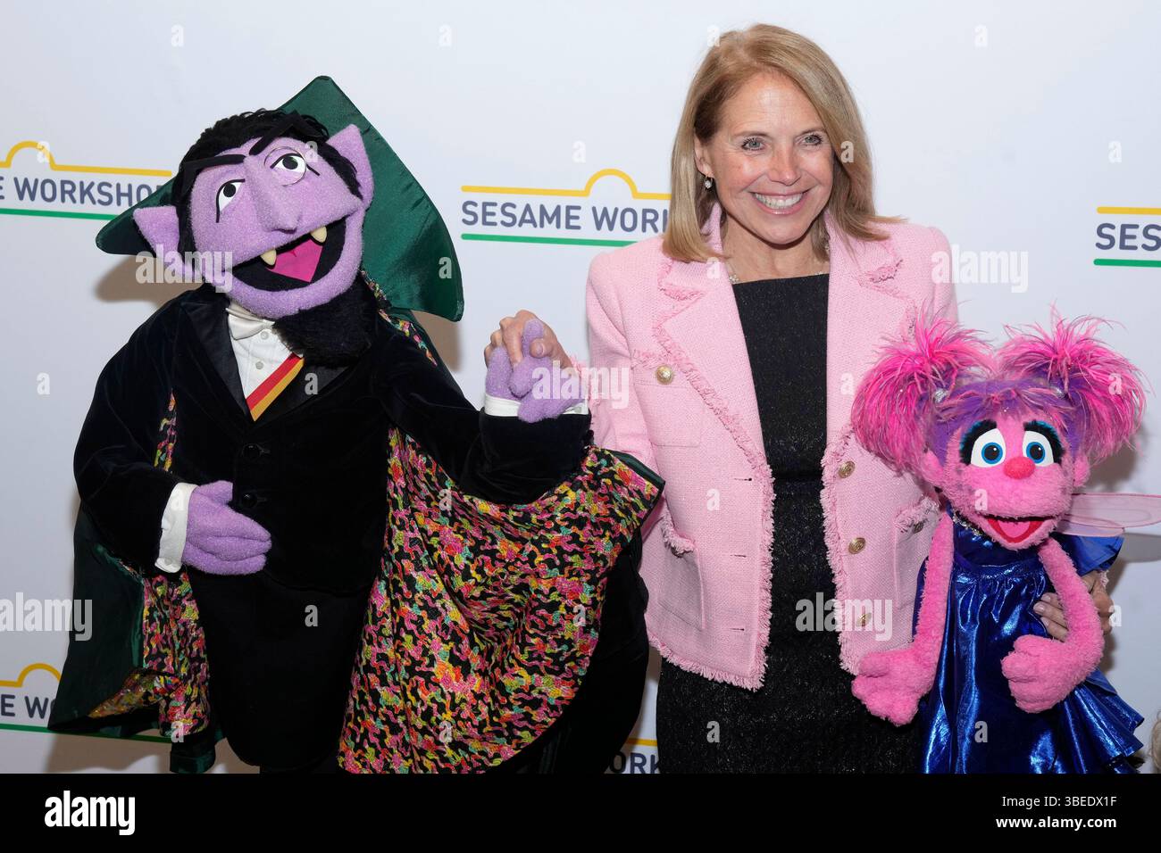 Katie Couric poses with Sesame Street Muppets at the Sesame Workshop ...