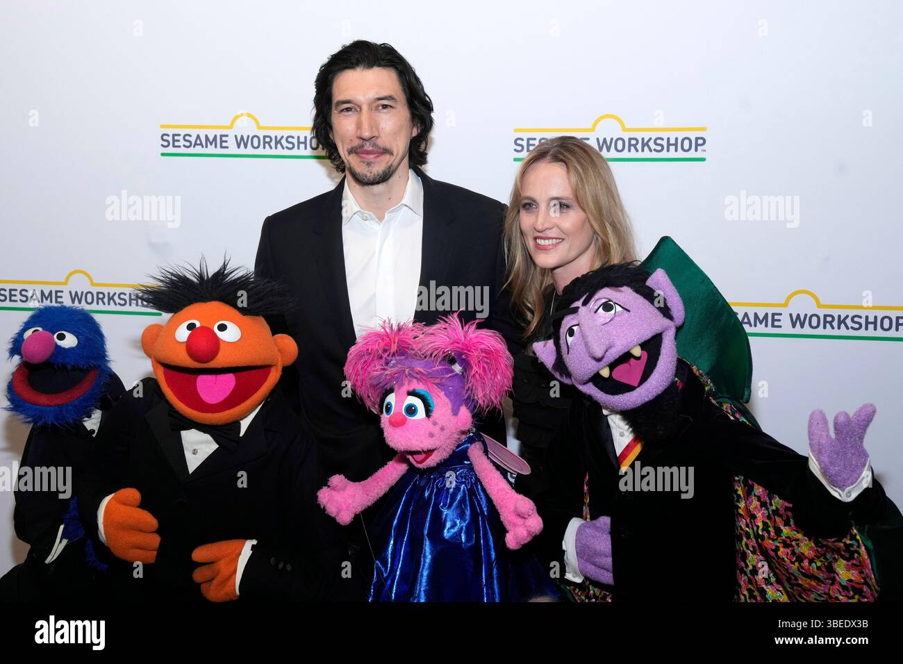 Adam Driver and Joanne Tucker pose with Sesame Street Muppets at the ...