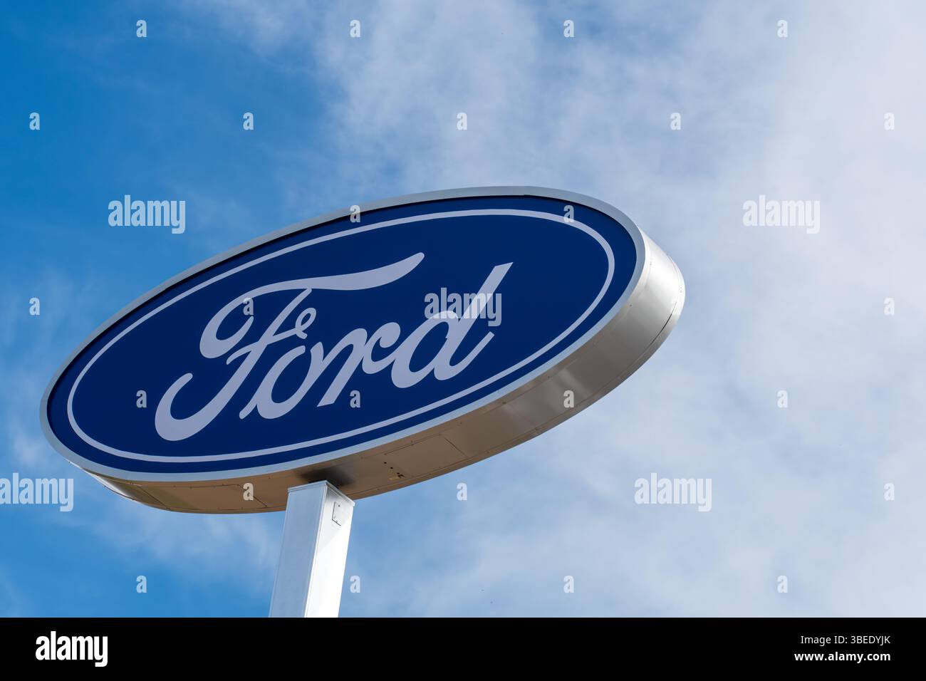 Spanish Fork, UT—May 28, 2025: A Ford dealership sign stands under a ...