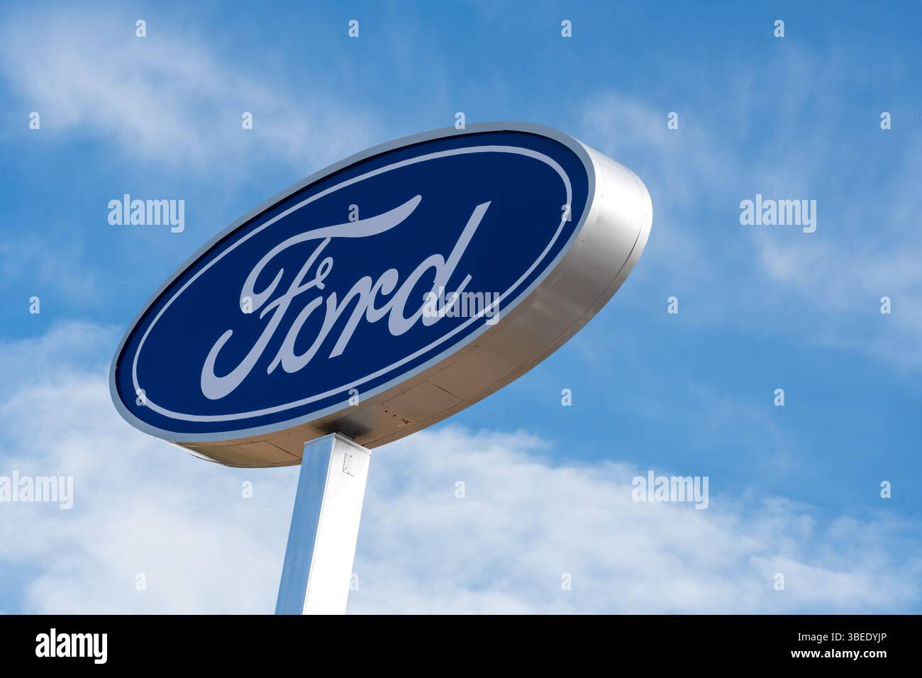 Spanish Fork, UT—May 28, 2025: A Ford dealership sign stands under a ...