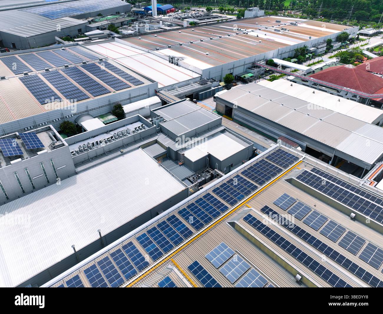 Solar-powered warehouse facility. Modern distribution center with ...
