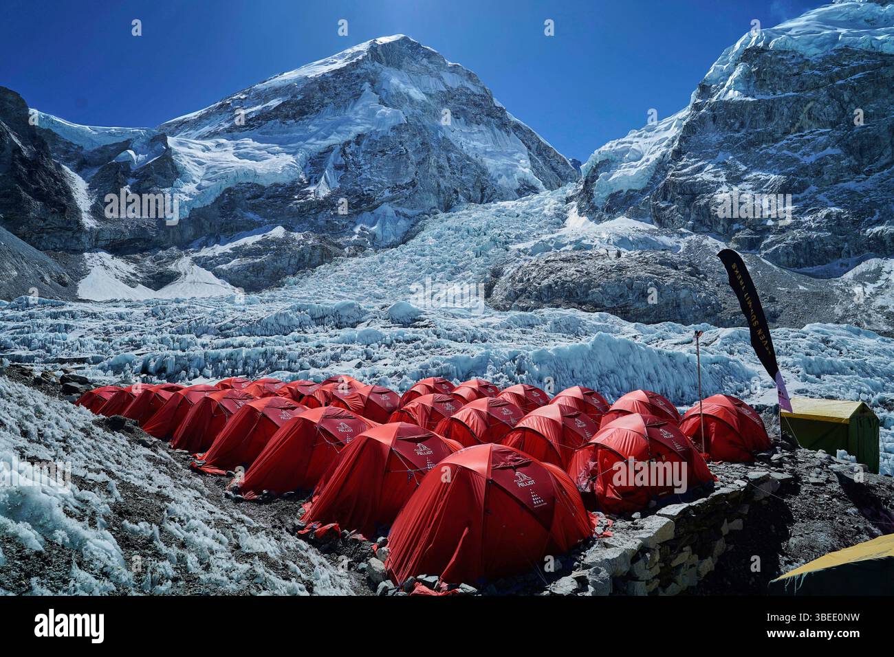 Khumbu Icefall is visible between two peaks in the background at the ...