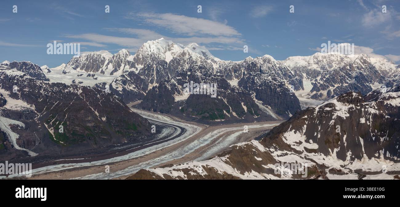 The amazing snow capped mountains of the Alaska Range rise above a ...
