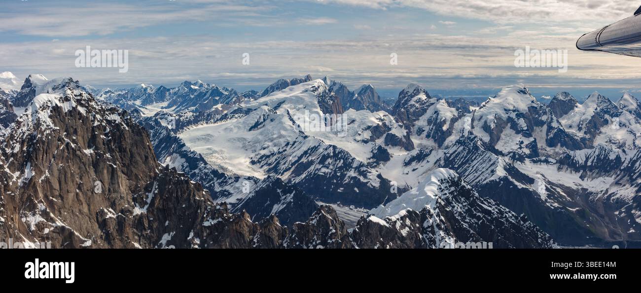 Panorama of the snow capped Alaska Range mountains captured from the ...