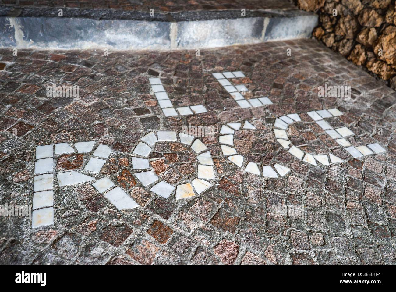 Cobblestone Pathway with Inlaid 'LE ROCCE' Text in Amalfi, Italy Stock ...
