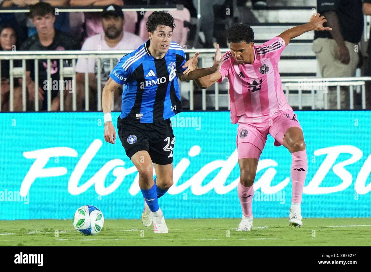 CF Montreal midfielder Caden Clark (23) and Inter Miami defender Ian ...