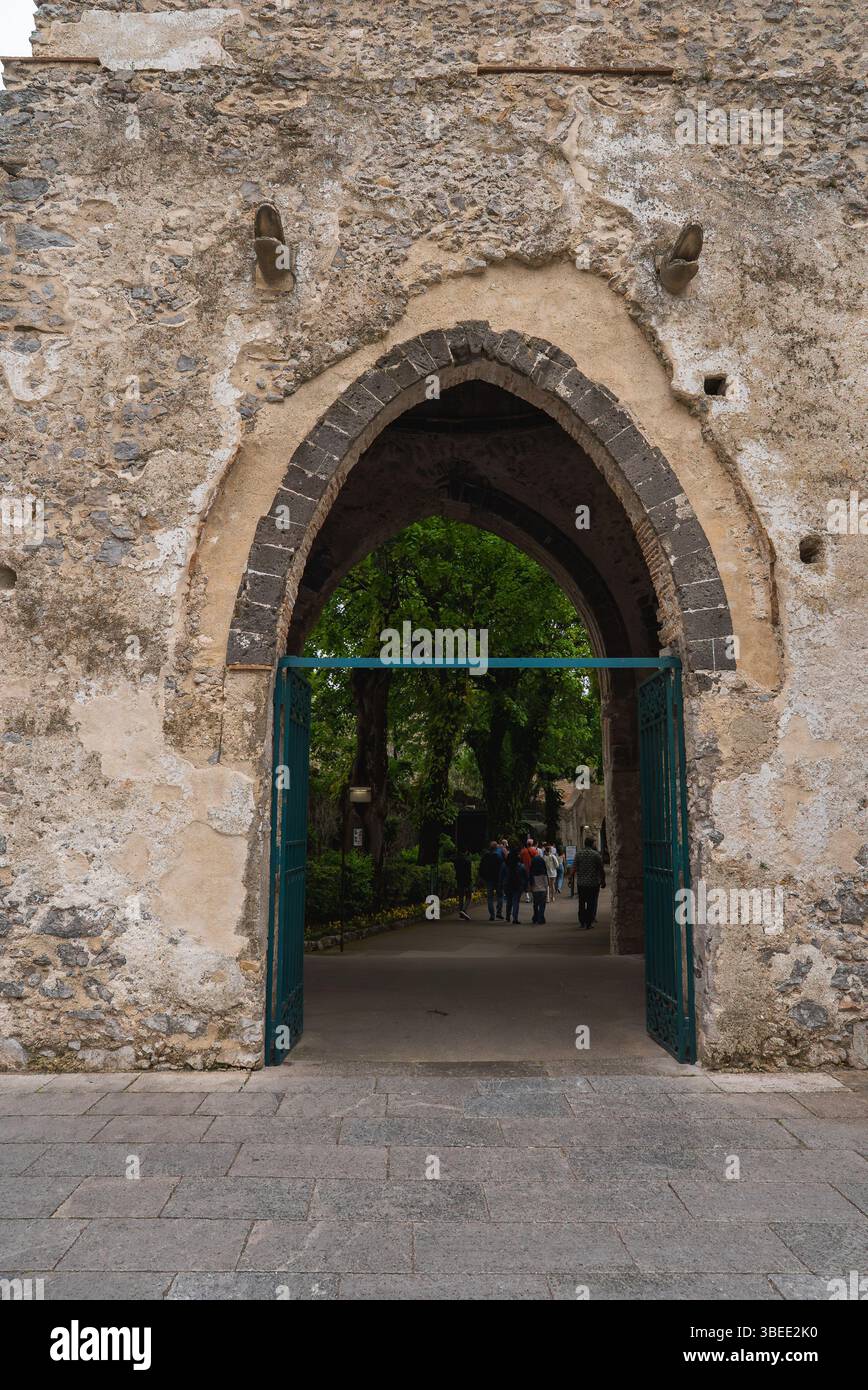 Historic Stone Archway with Green Gates in Ravello, Italy Stock Photo ...