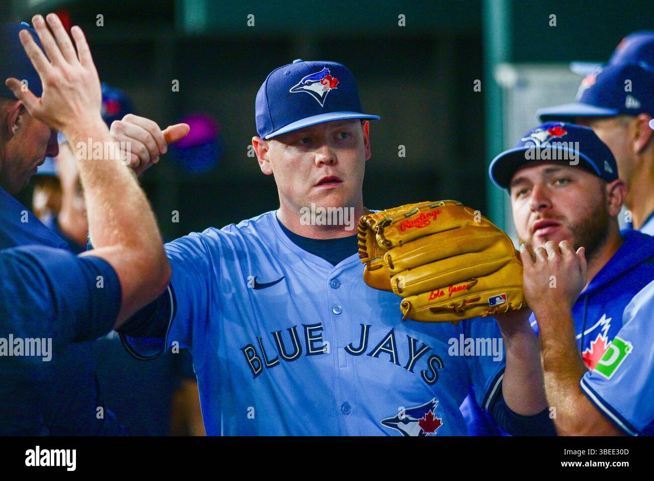 Toronto Blue Jays' starting pitcher Paxton Schultz is greeted by ...