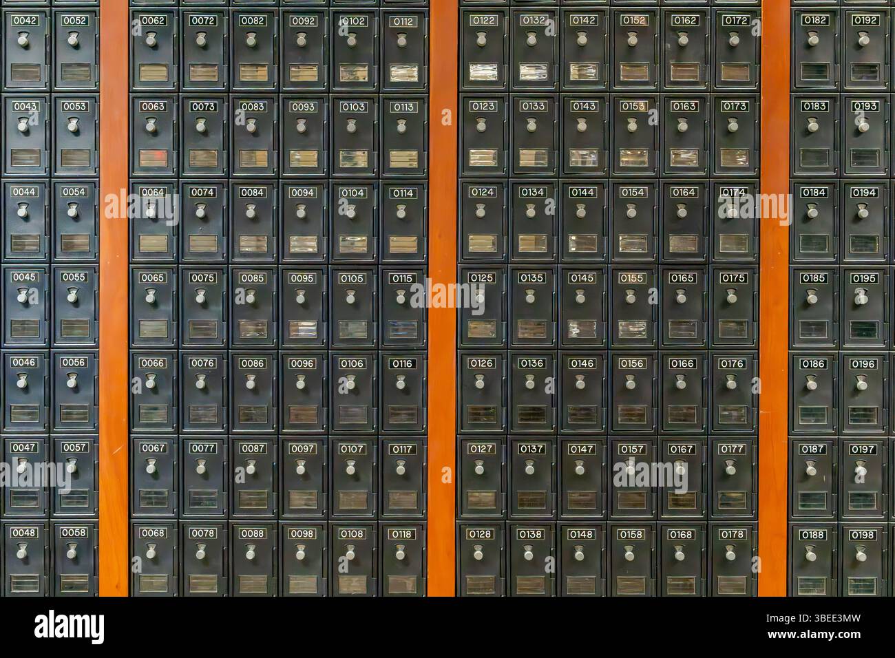 Photo of rows of numbered brown metal college, university campus mail ...