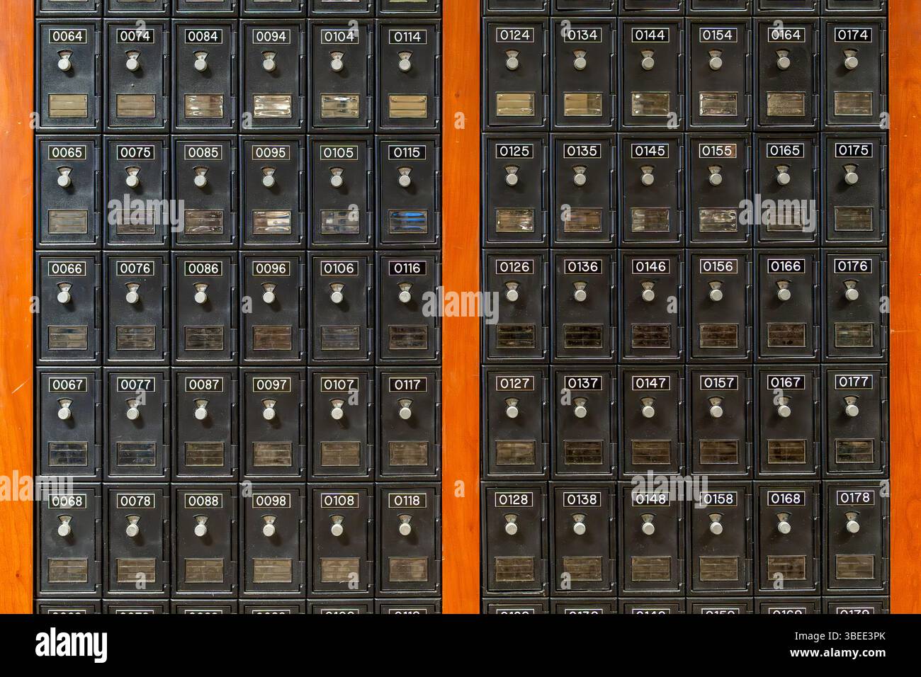 Photo of rows of numbered brown metal college, university campus mail ...