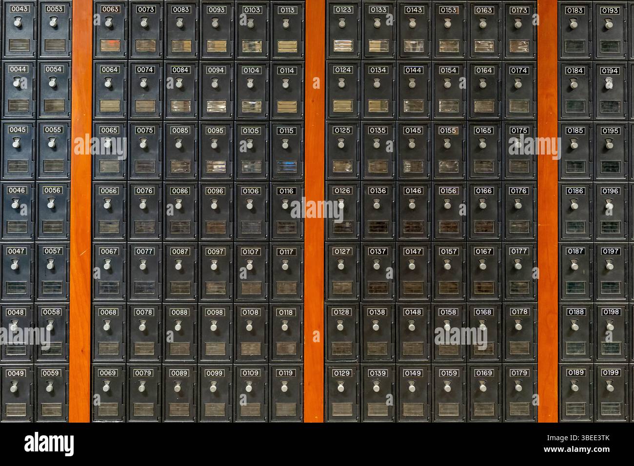 Photo of rows of numbered brown metal college, university campus mail ...