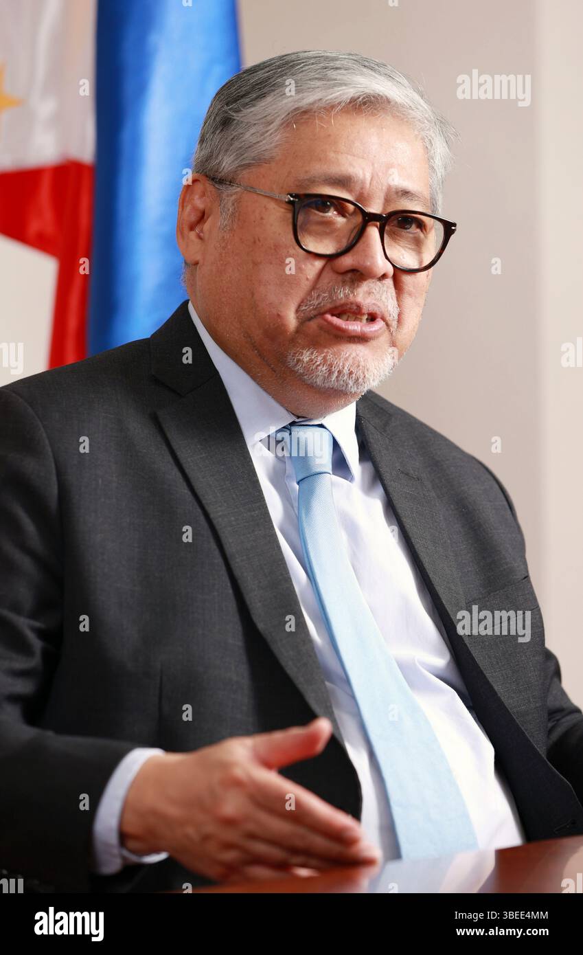 Philippine Foreign Minister Enrique Manalo speaks during an interview ...