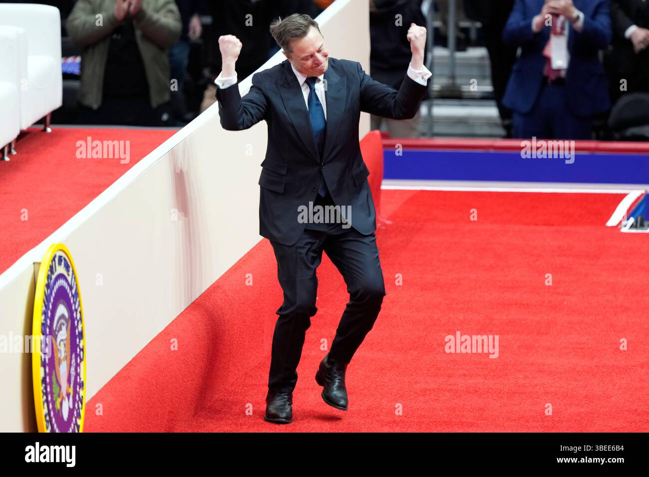 FILE - Elon Musk arrives on stage to speak at an indoor Presidential ...