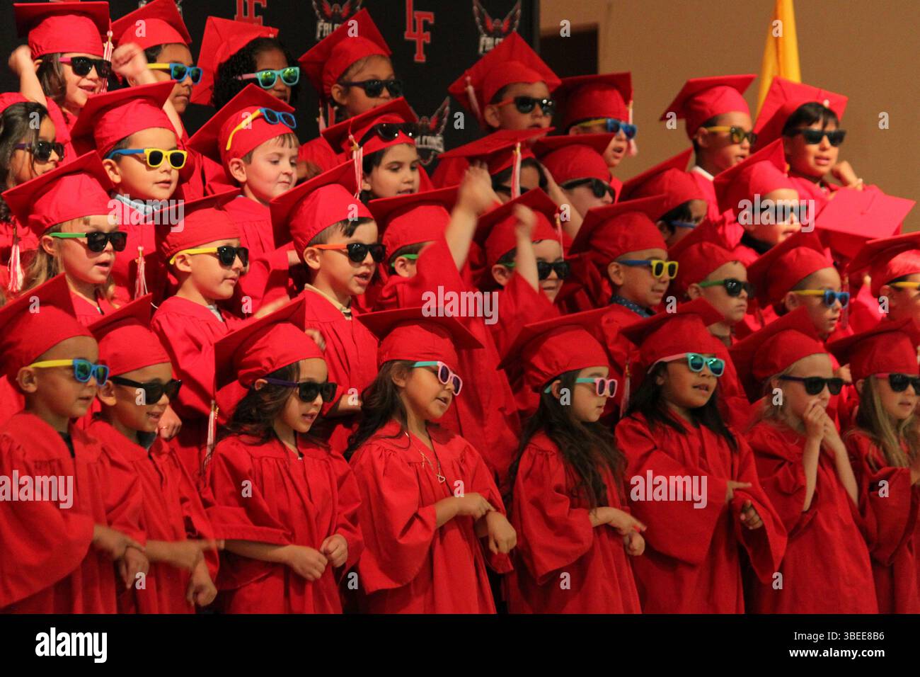 Kindergartners perform during their graduation during a ceremony at the ...