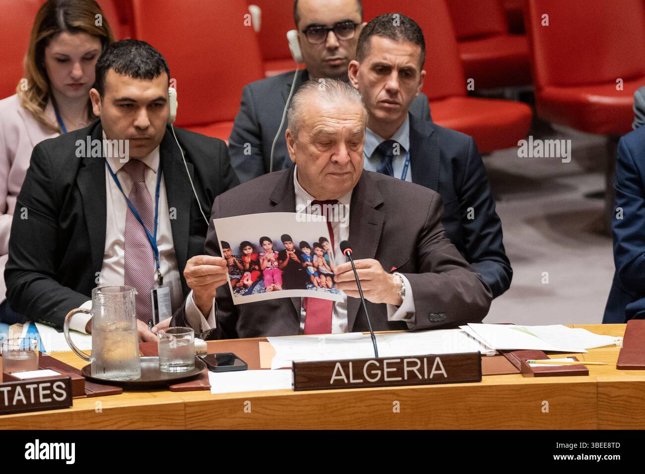 New York, USA. 28th May, 2025. Ambassador Amar Bendjama of Algeria holds photo of doctor's ...