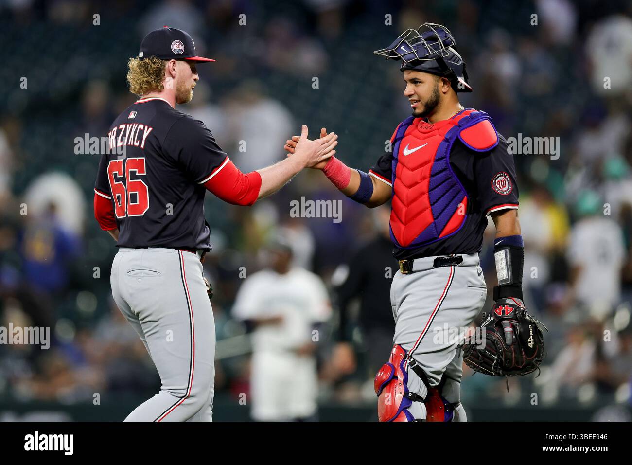 Washington Nationals relief pitcher Zach Brzykcy, left, celebrates with ...