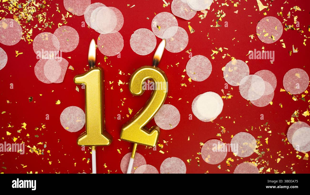 Golden burning candle number digit twelve. Birthday greeting card with ...