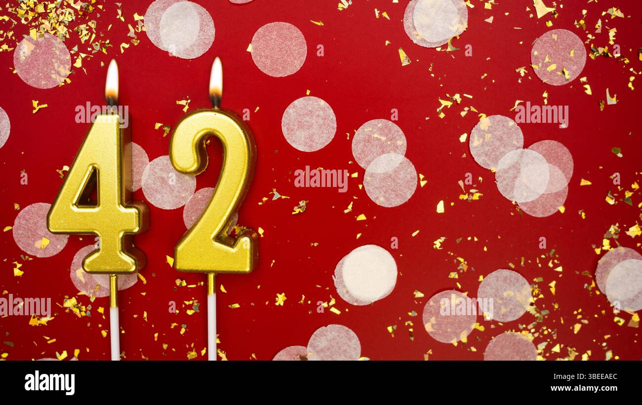 Golden burning candle number digit forty-two. Birthday greeting card ...