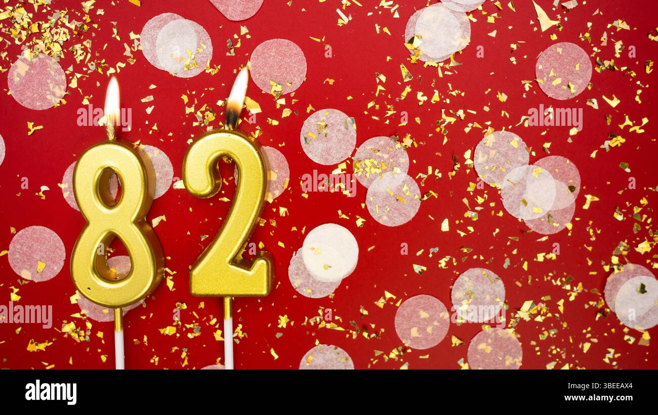 Golden burning candle number digit eighty-two. Birthday greeting card ...