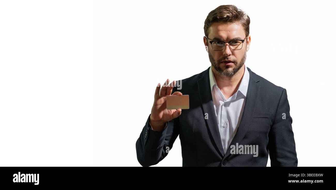 Handsome man holding credit card. Middle aged man in suit with credit ...
