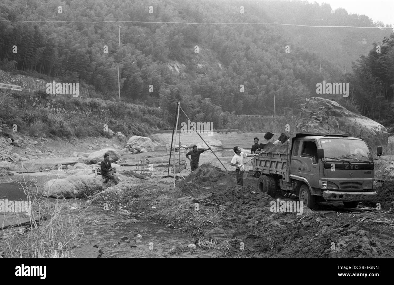 Sand Mining in Riverbed – Workers in Zhejiang, China Stock Photo - Alamy