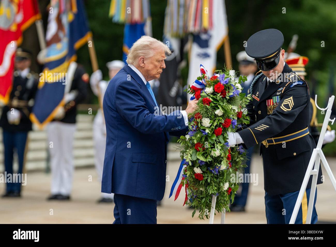 President Donald Trump participates in a wreath-laying ceremony at the ...