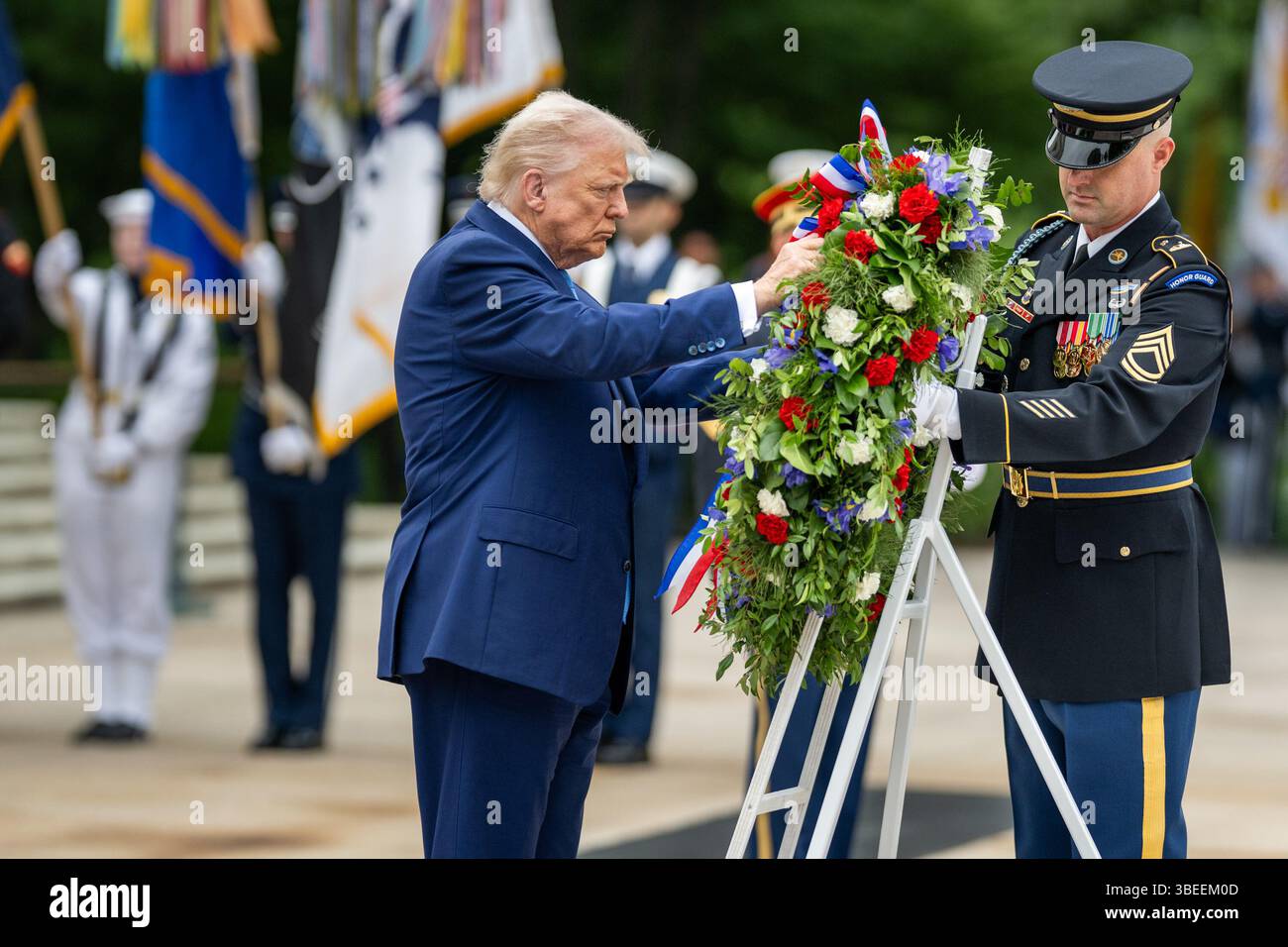 President Donald Trump participates in a wreath-laying ceremony at the ...