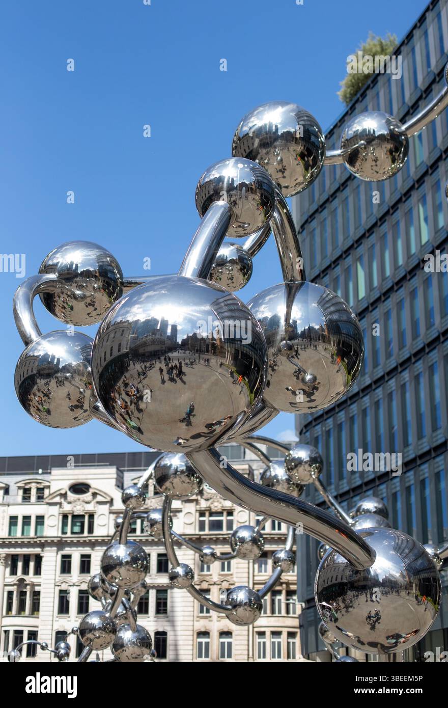 Metallic spheres create a reflective art installation with city ...
