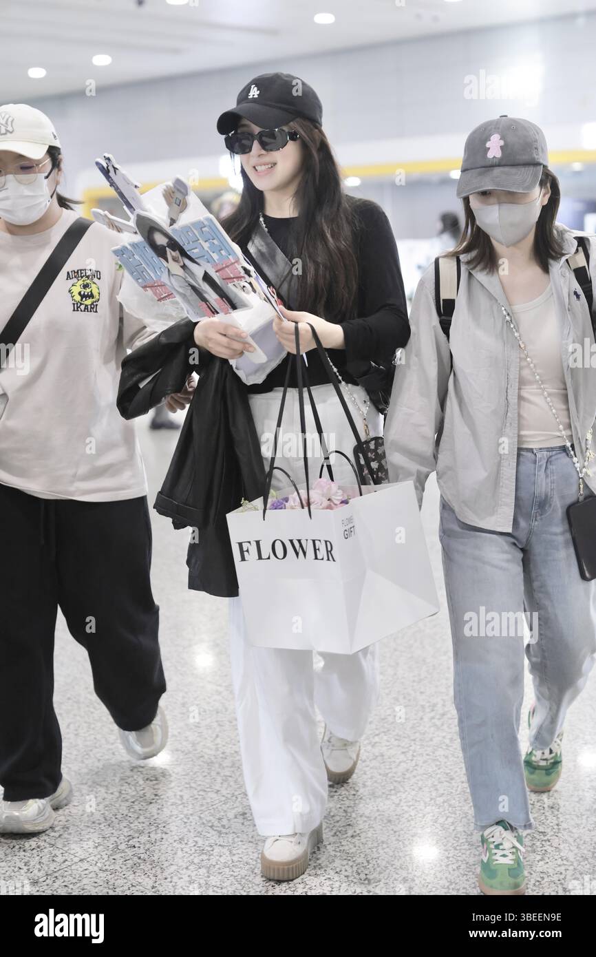 Chinese singer and actress Zhang Hanyun appears at the airport in ...