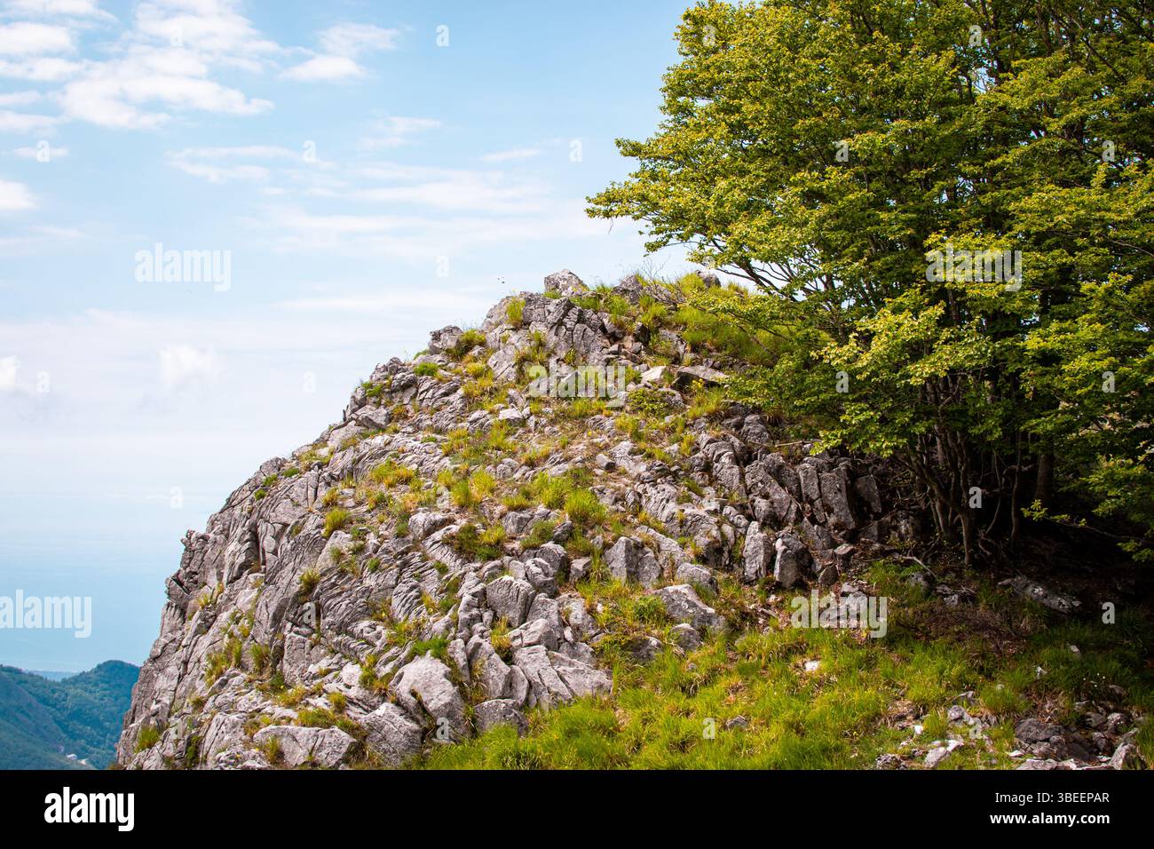 Majestic mountain peaks rise against the sky, a breathtaking view of ...