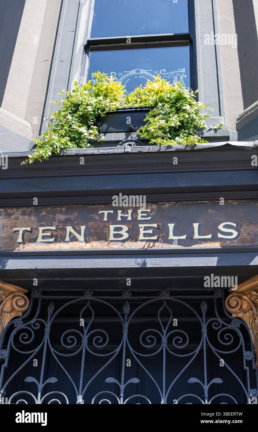 The iconic entrance of The Ten Bells pub in London features classic ...