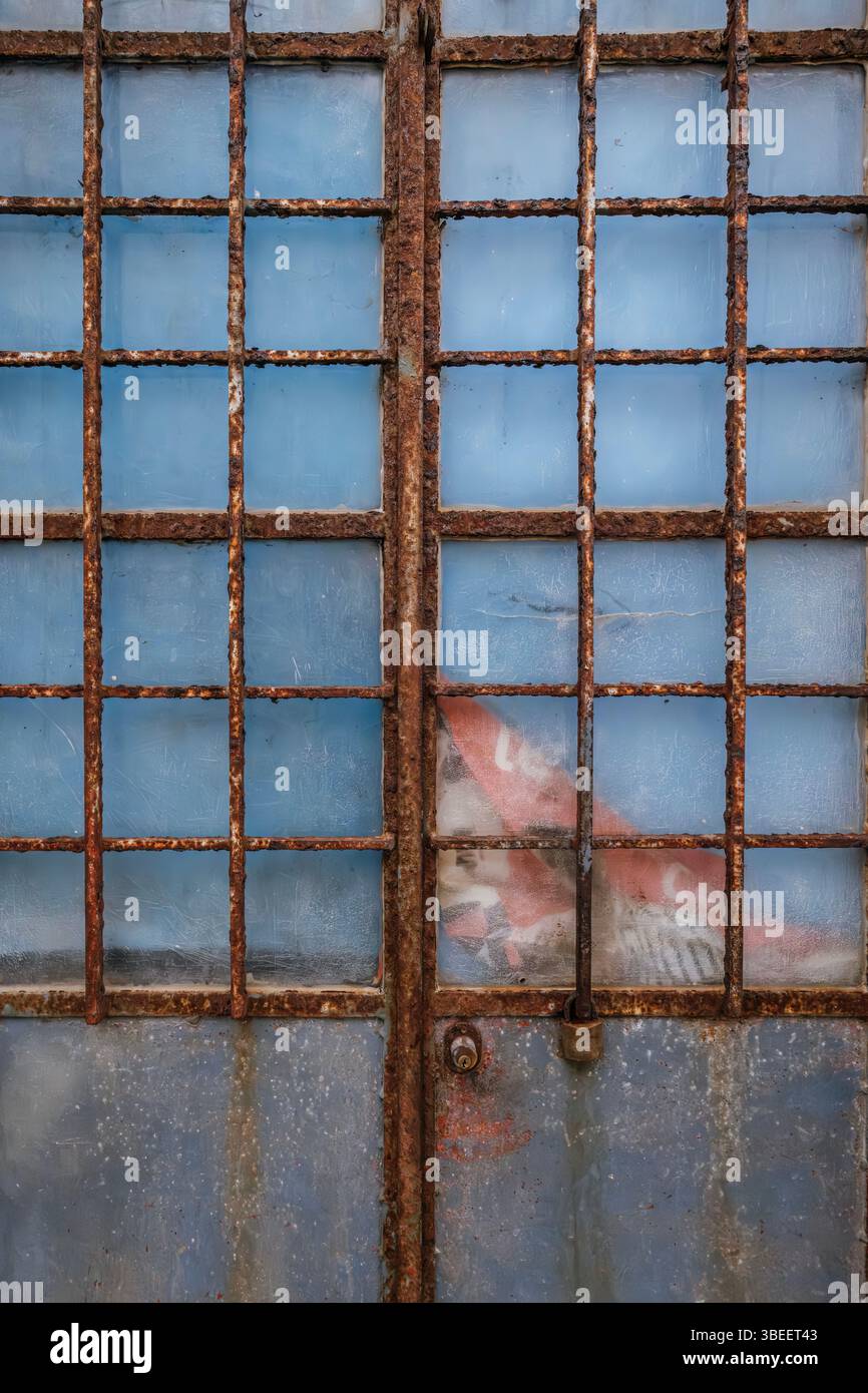 Rusty Metal Grid Door With Blue Painted Surface And Weathered Texture. Industrial Security Door ...