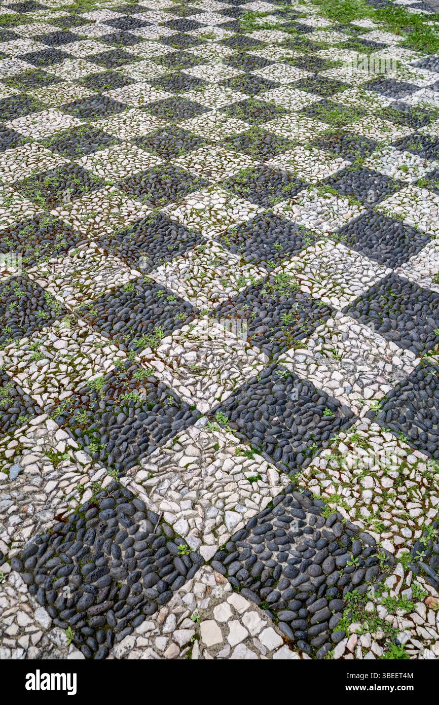 Traditional Portuguese Cobblestone Pavement With Black And White Stone ...