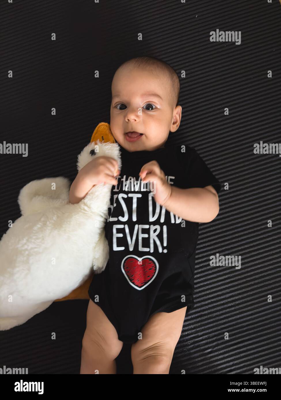overhead portrait of baby laying down on the back Stock Photo - Alamy