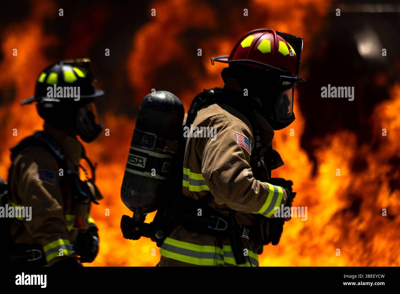 Firefighters assigned to the 628th Air Base Wing conduct a live fire ...