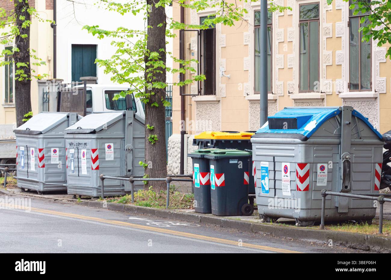Padua, Italy - April 14, 2025: Various Large trash bins on the street ...