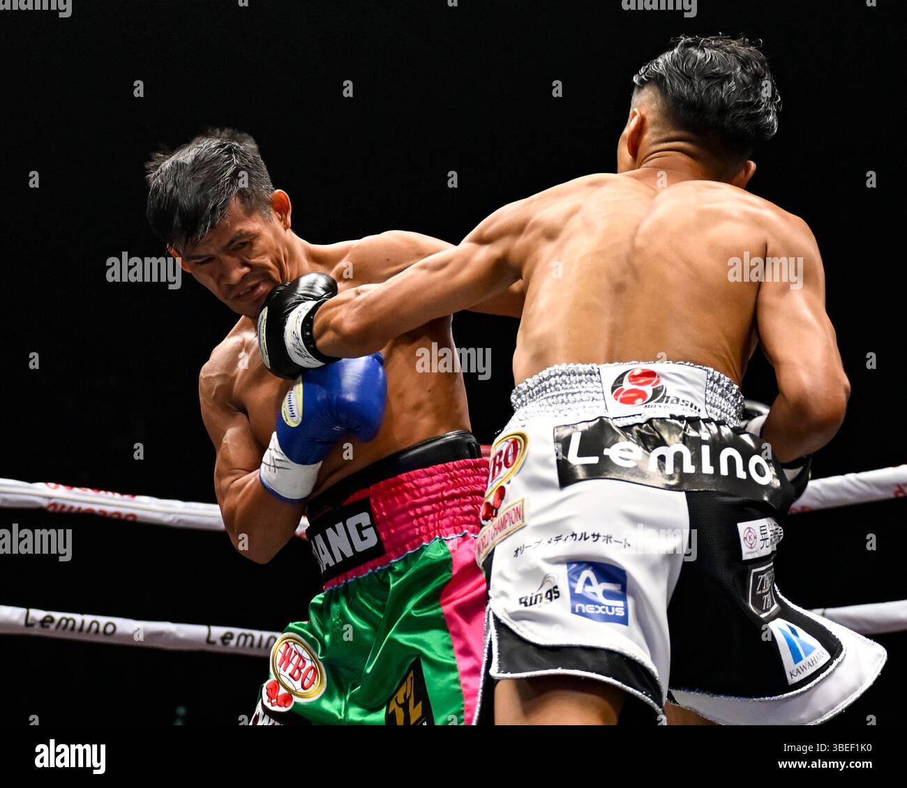 Champion Yoshiki Takei (black gloves) of Japan and challenger Yuttapong ...