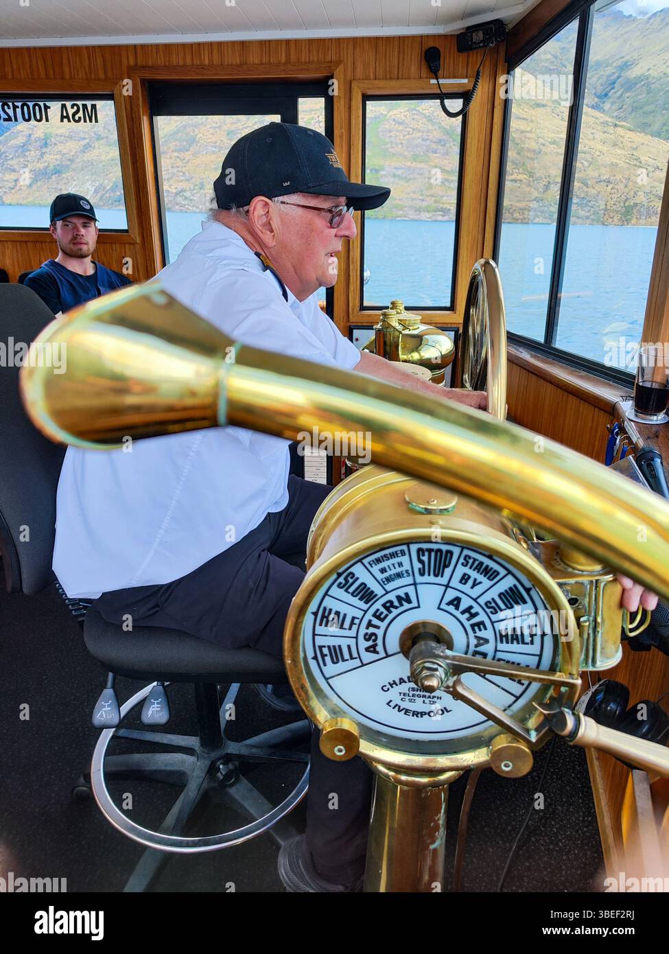 Queenstown, New Zealand - 6 February 2025: steamship captain in lake ...