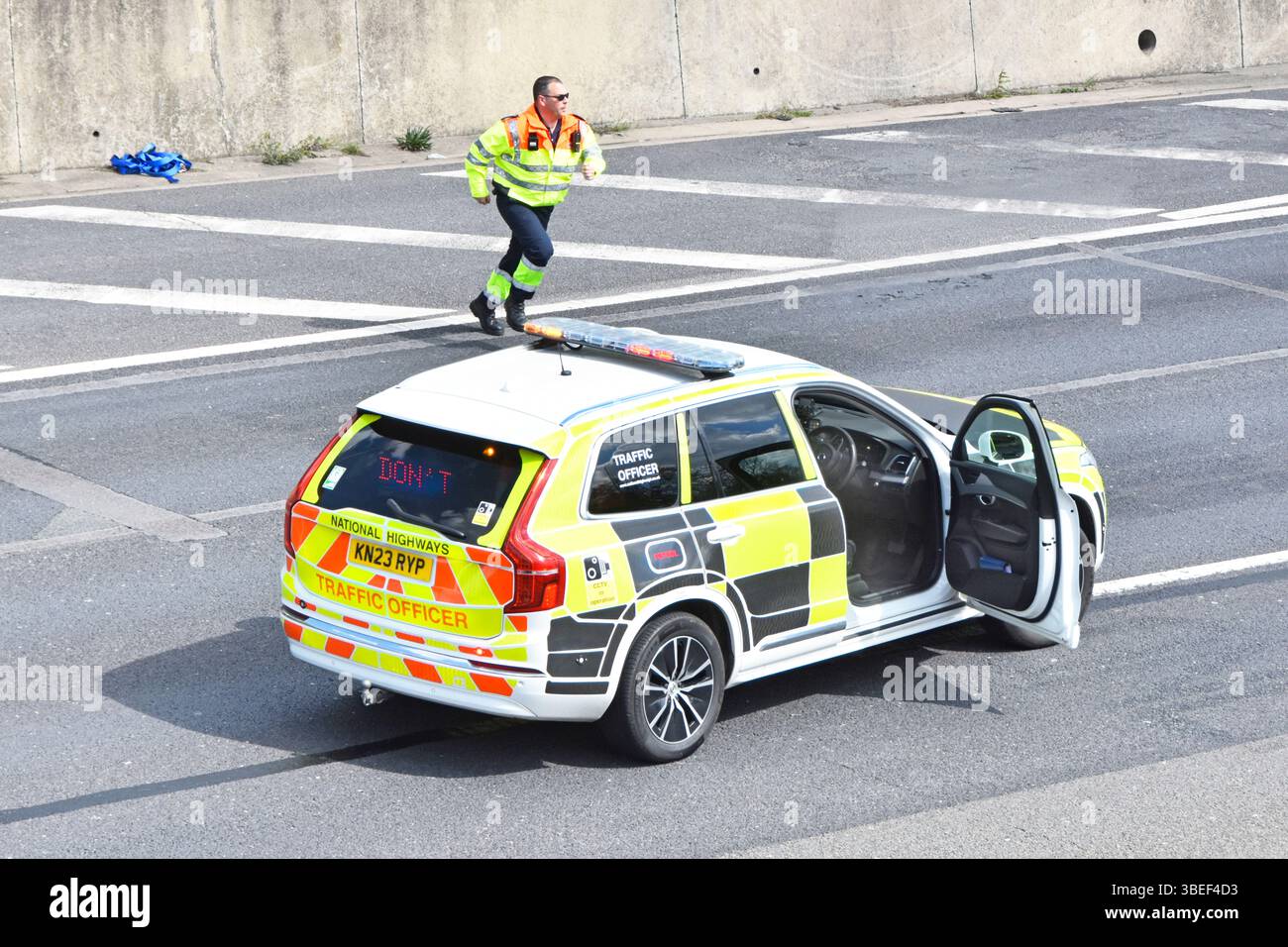 National Highways Traffic Officer at work halts rolling road block M25 ...
