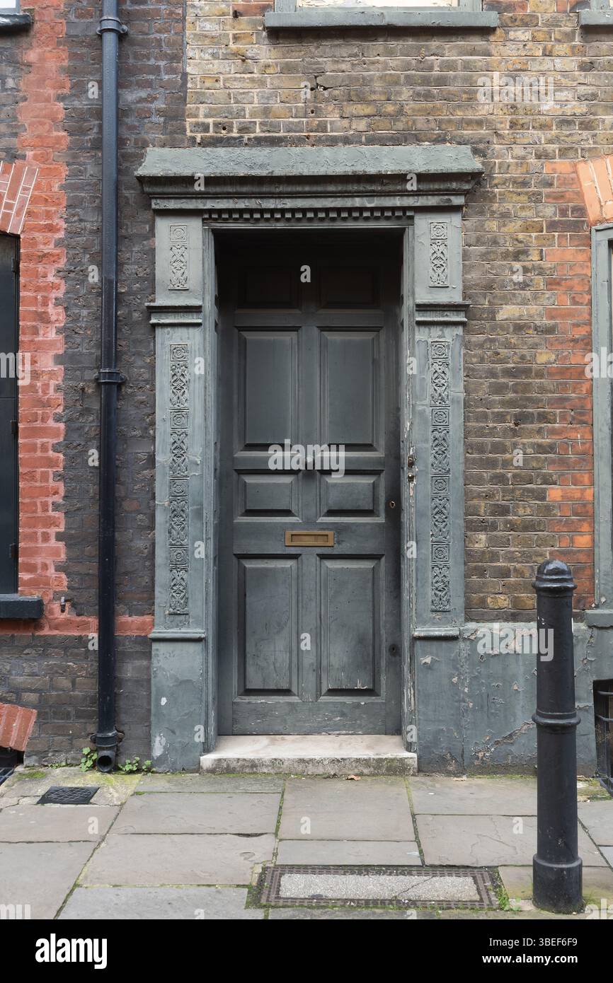 Georgian style grey front door with decorated jambs in London Stock ...