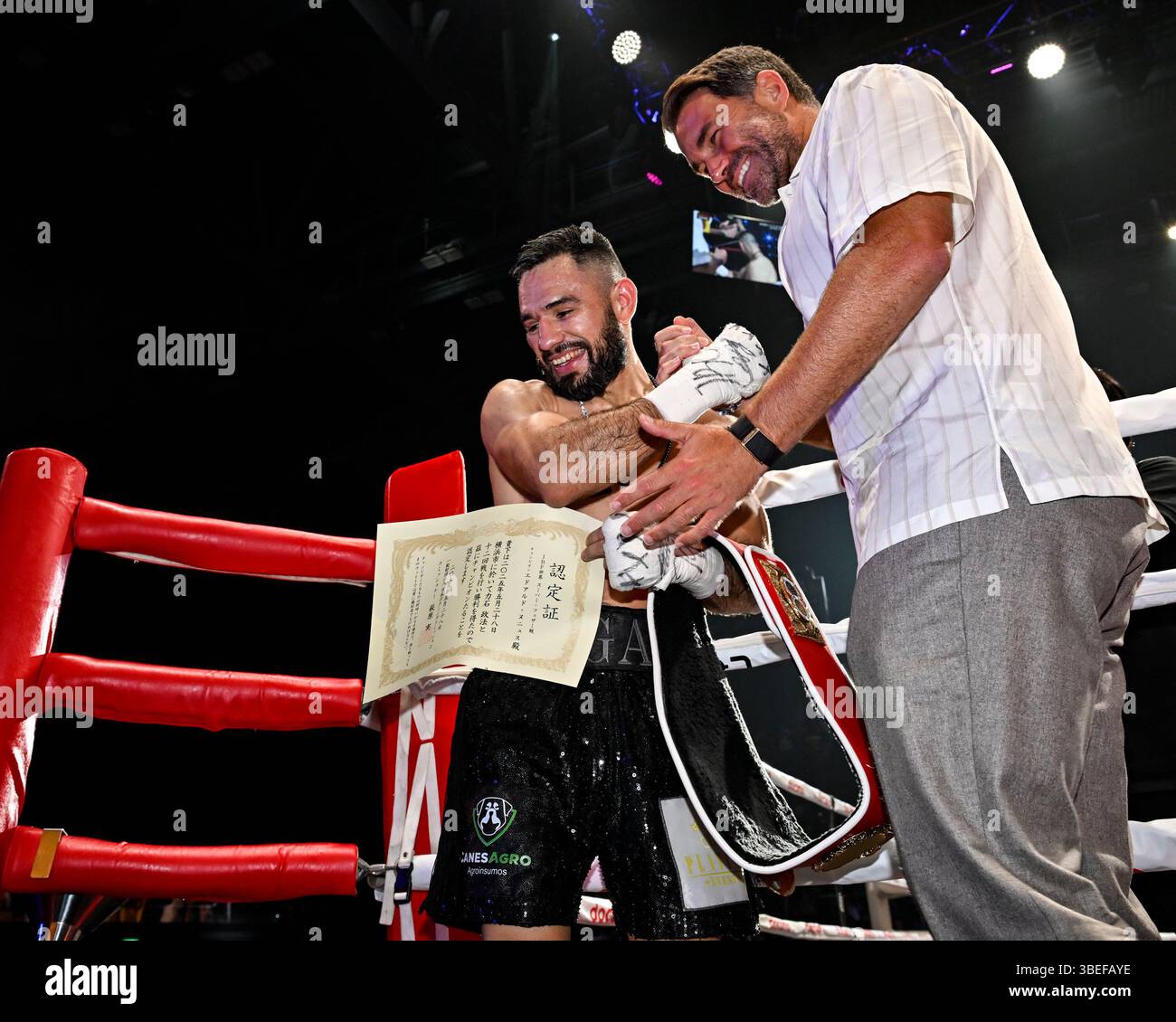 Eduardo Nunez (L) of Mexico celebrates with promoter Eddie Hearn after ...