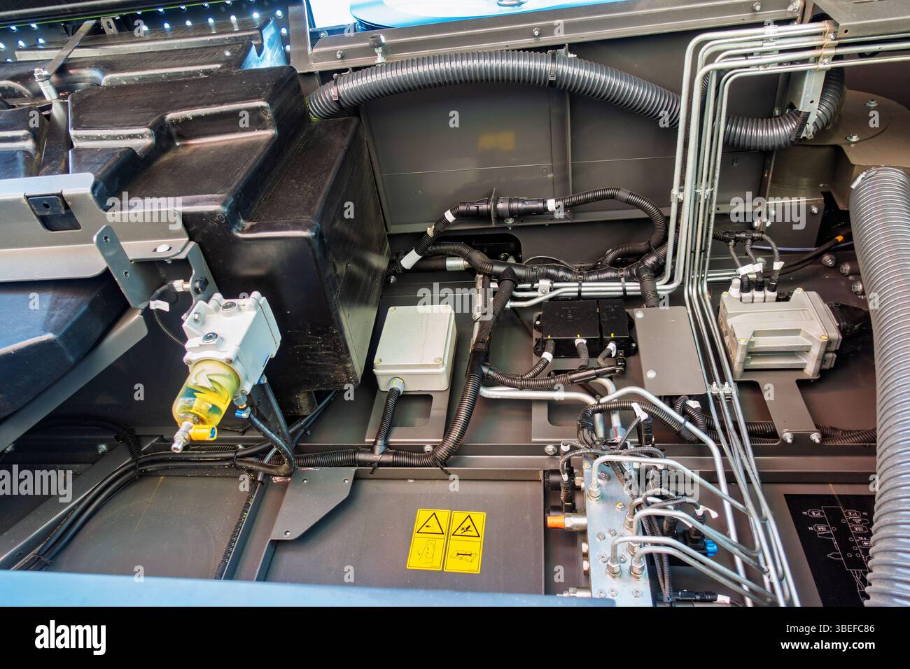 Close up of a Complex System of Hydraulic Lines and Various Components ...