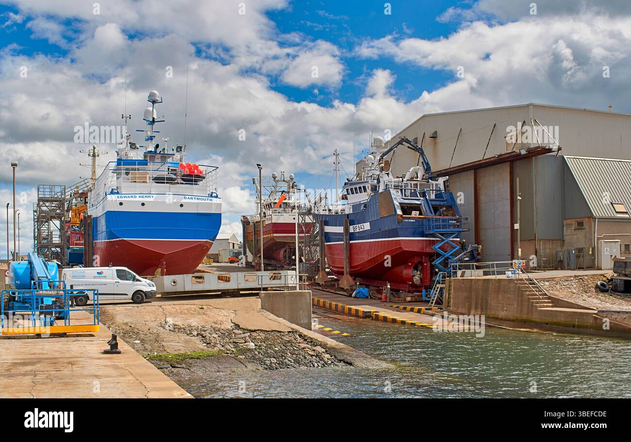 Macduff Shipyards Aberdeenshire Scotland men repairing or working on ...