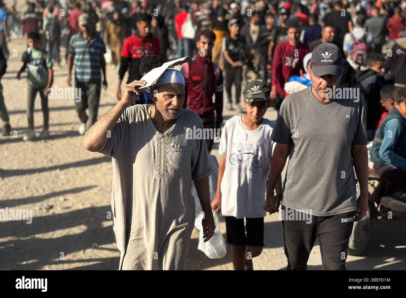 Relatives of Palestinians who lost their lives mourn after the Israeli ...