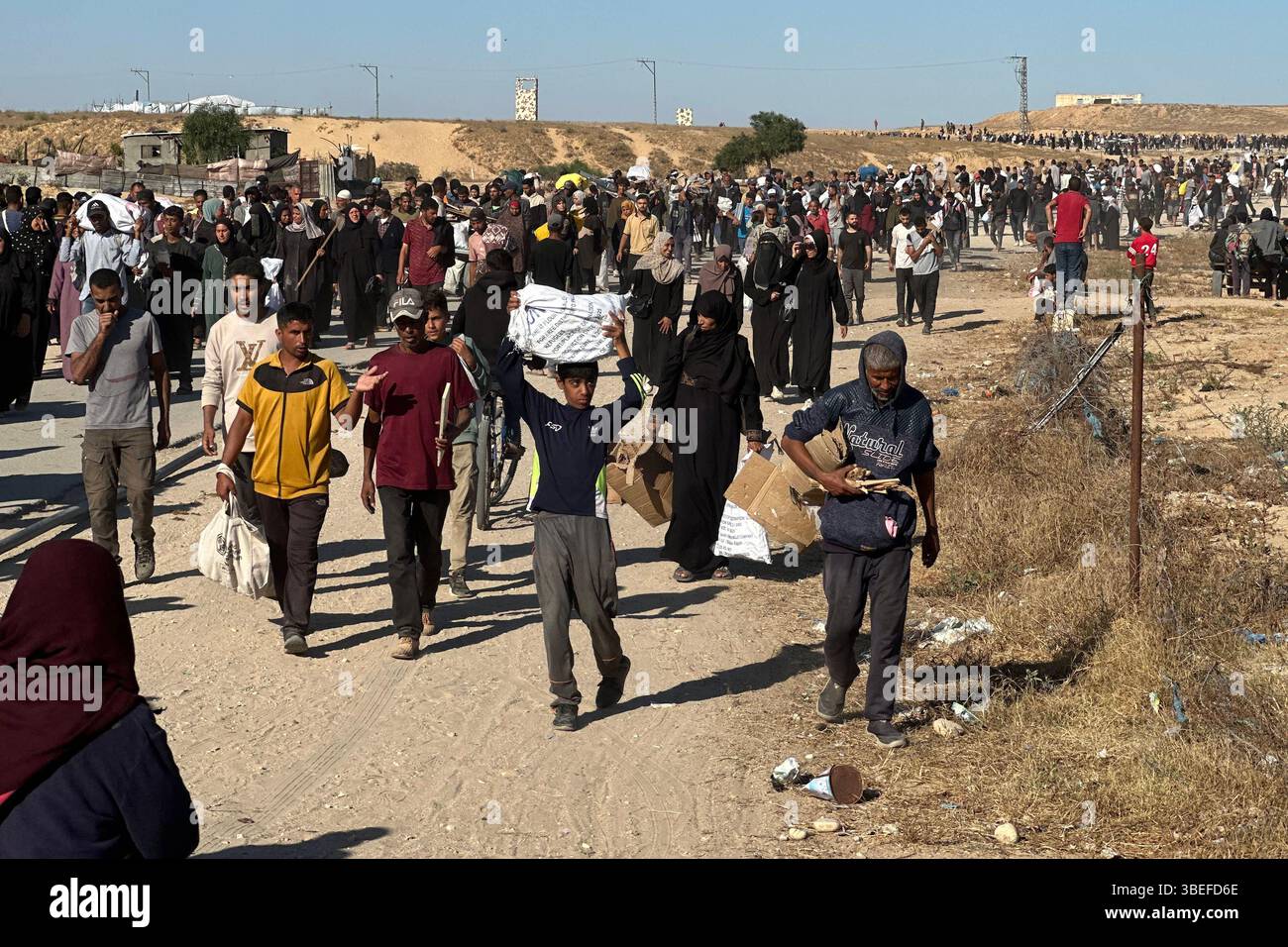 Relatives of Palestinians who lost their lives mourn after the Israeli ...