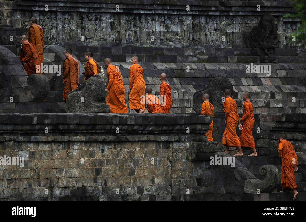 Buddhist monks walk up Borobudur Temple ahead of a visit by Indonesia's ...